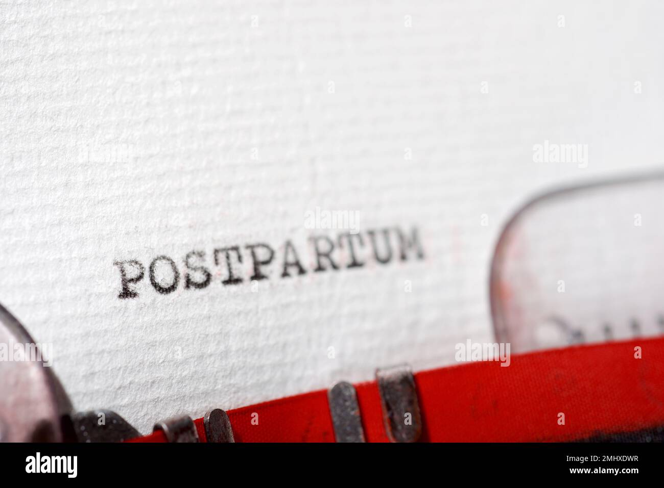 Postpartum word written with a typewriter Stock Photo - Alamy