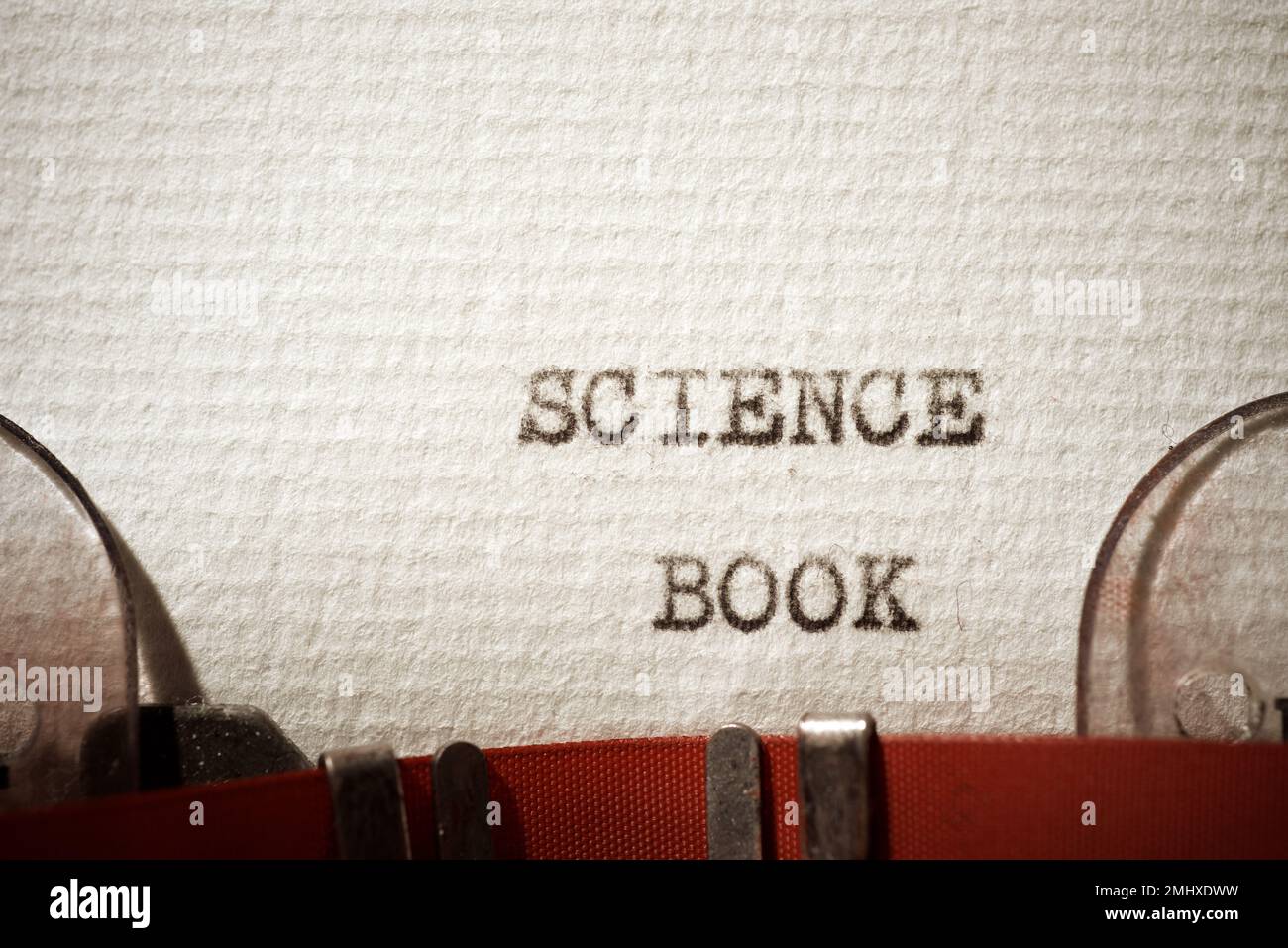 Science book text written with a typewriter Stock Photo - Alamy