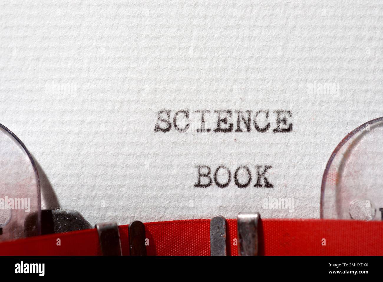 Science book text written with a typewriter Stock Photo - Alamy