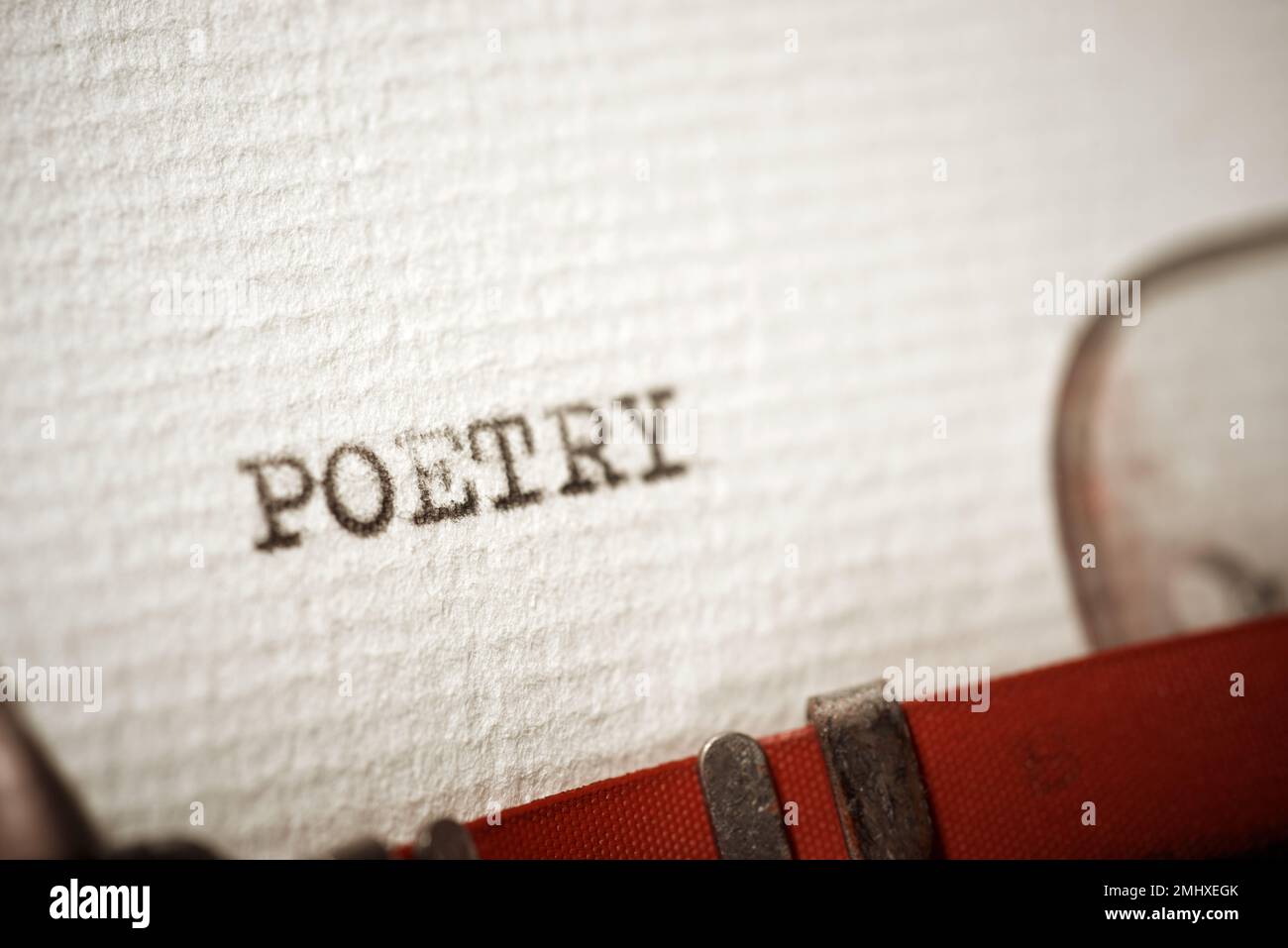 Poetry word written with a typewriter Stock Photo - Alamy