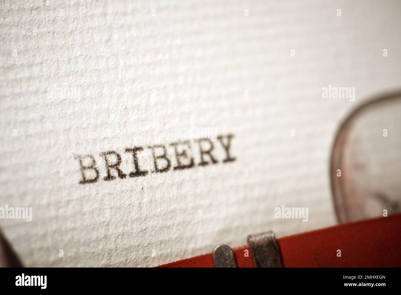 Bribery word written with a typewriter Stock Photo - Alamy