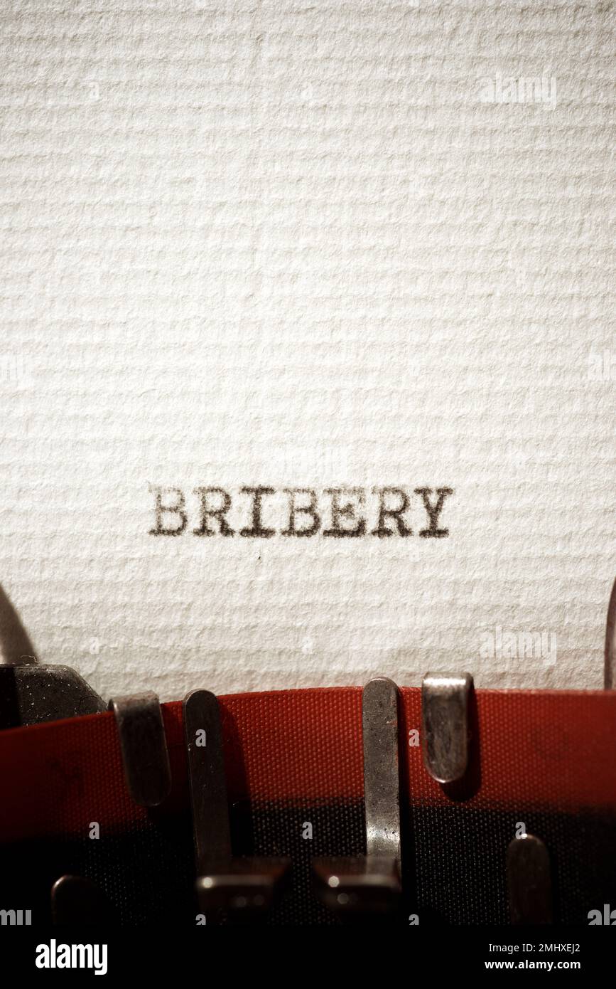 Bribery word written with a typewriter Stock Photo - Alamy