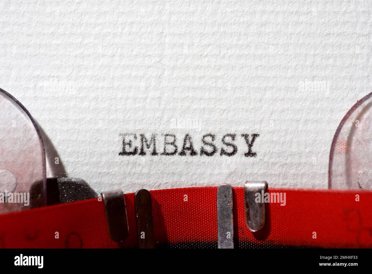 Embassy word written with a typewriter Stock Photo - Alamy