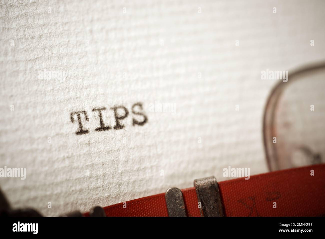 Tips word written with a typewriter Stock Photo - Alamy