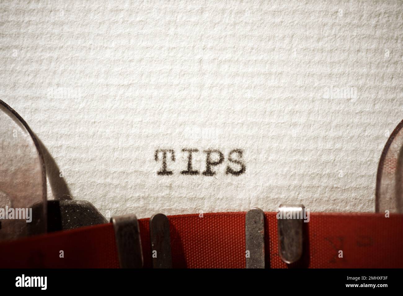 Tips word written with a typewriter Stock Photo - Alamy