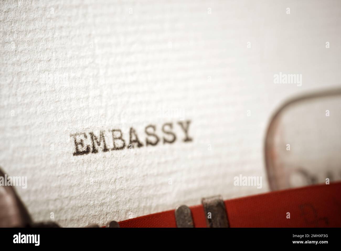 Embassy word written with a typewriter Stock Photo - Alamy
