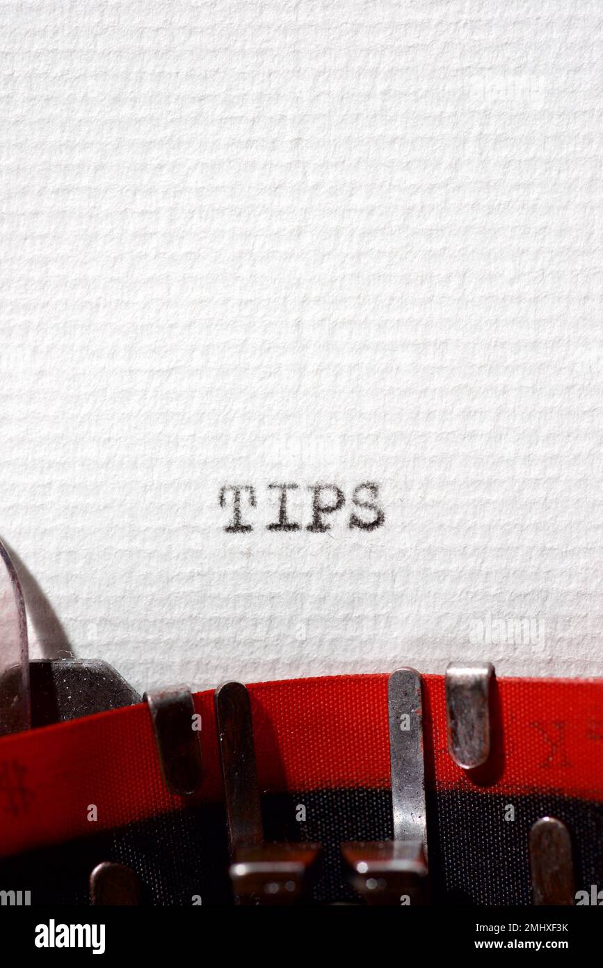 Tips word written with a typewriter Stock Photo - Alamy