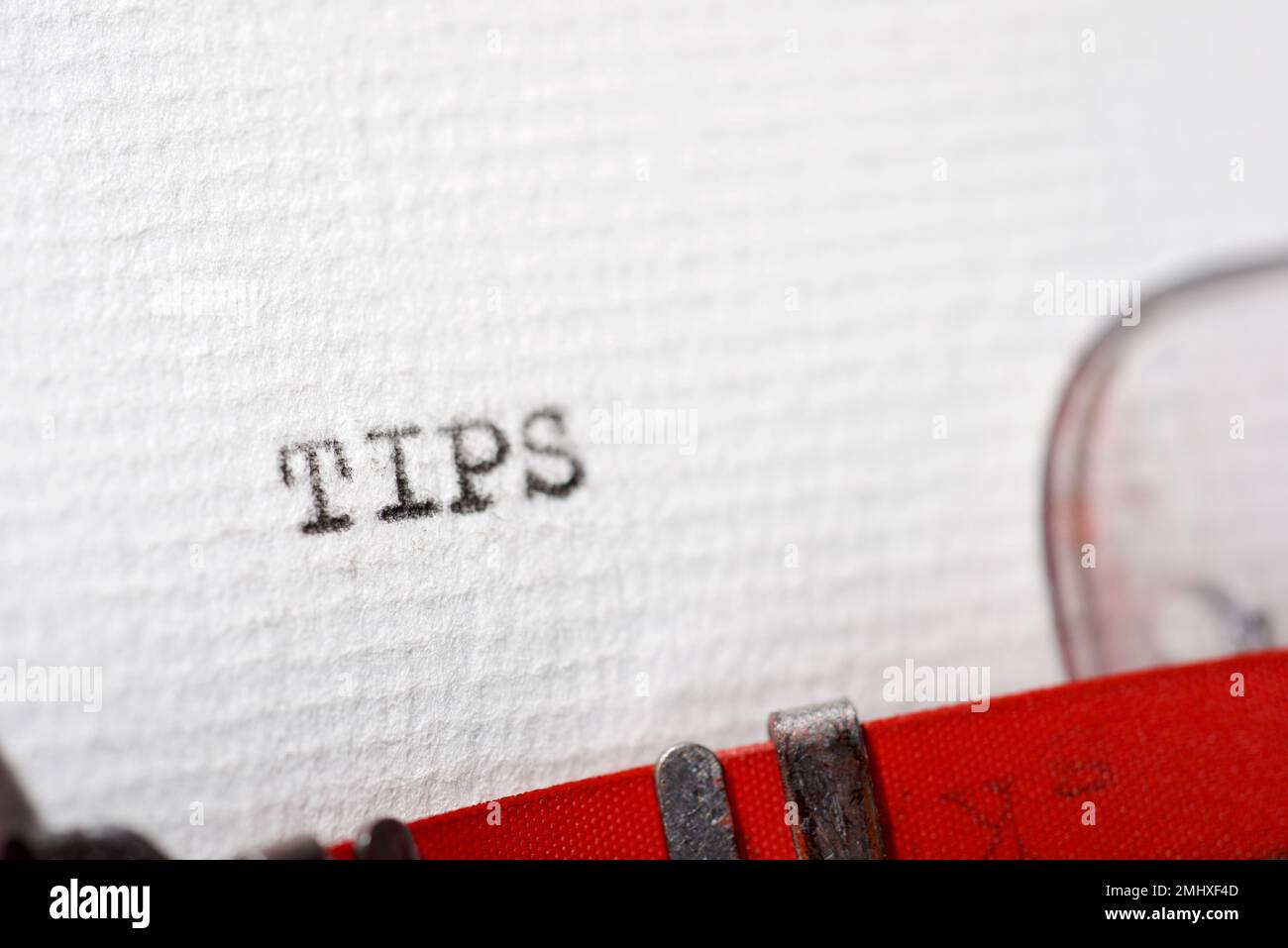 Tips word written with a typewriter Stock Photo - Alamy