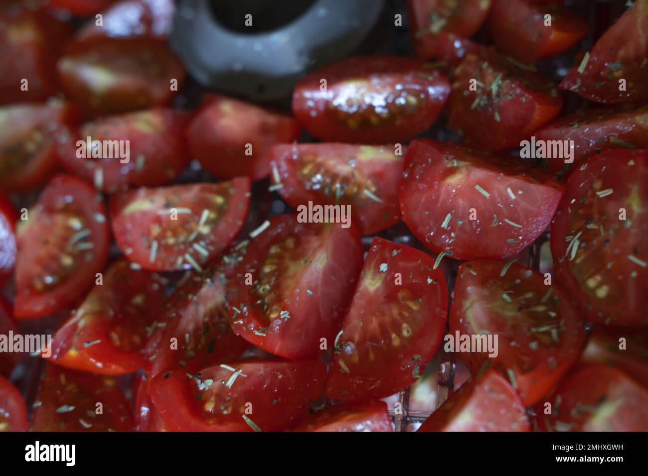 Traditional Italian sun-dried tomatoes. Preparing for sun drying slices ...