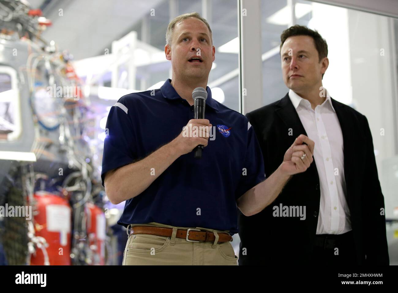 NASA Administrator Jim Bridenstine, left, talks with SpaceX chief ...