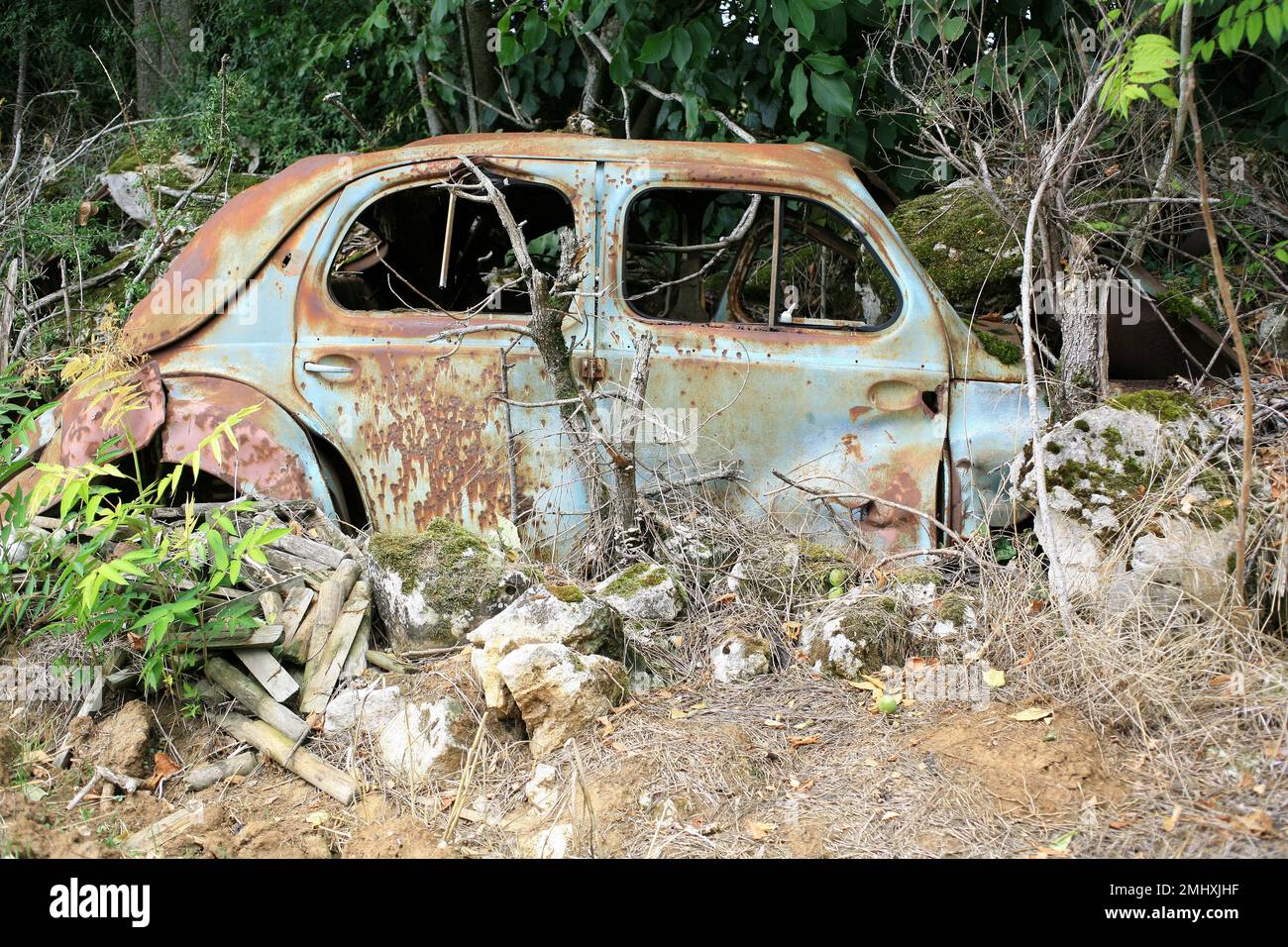 An old rusted car that had crashed into a wall and abandoned, Merigny ...