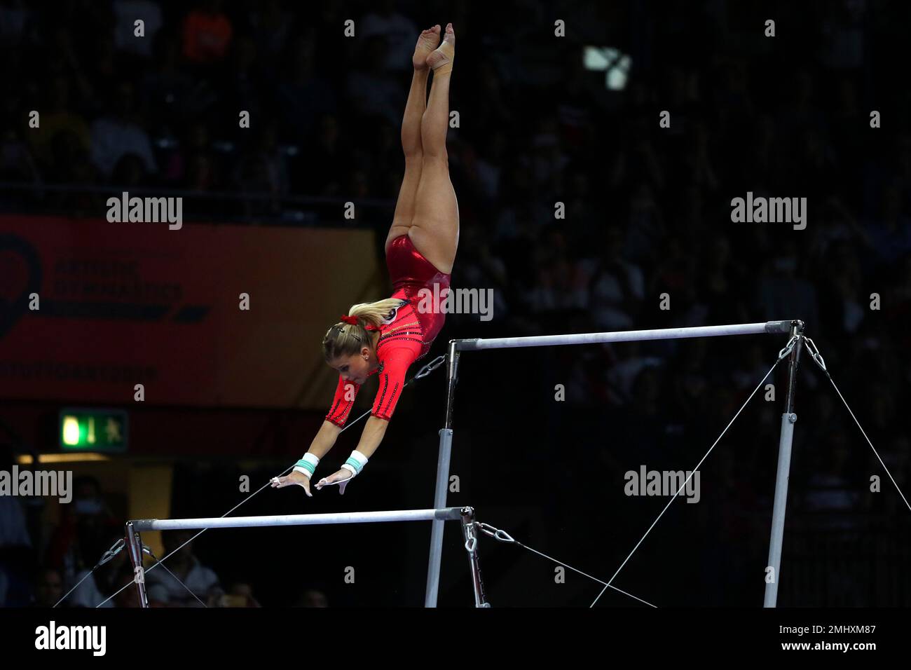Elizabeth Seitz of Germany performs on the uneven bars in the women's ...