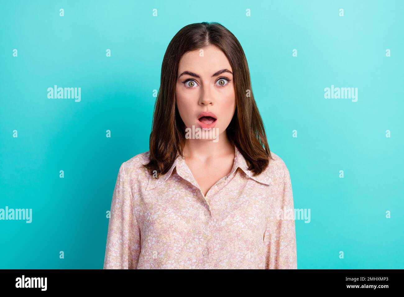 Photo portrait of nice young woman astonished shocked staring dressed ...