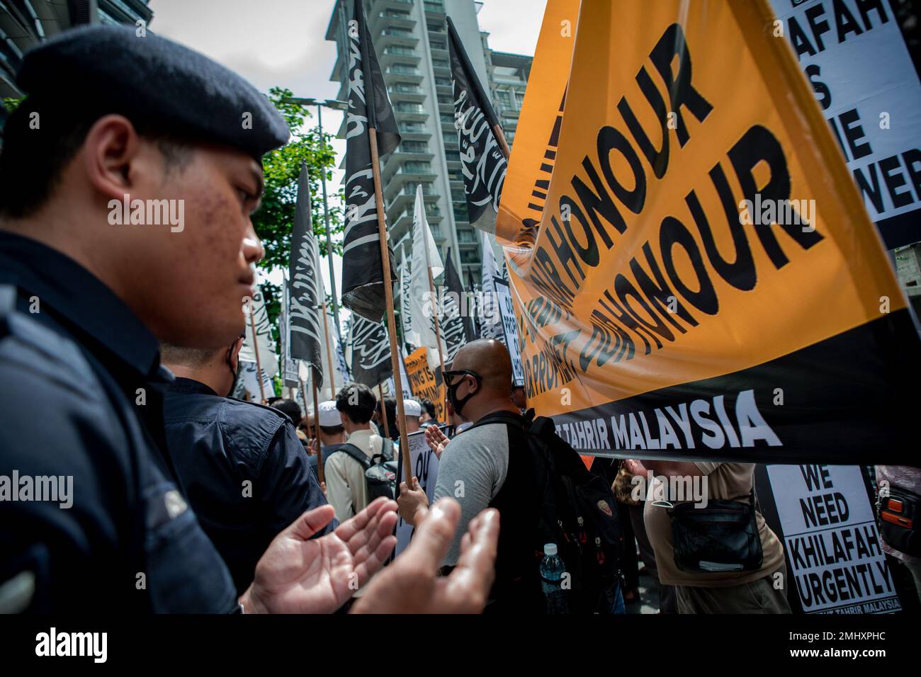 Kuala Lumpur, Malaysia. 27th Jan, 2023. Malaysian Muslims hold a banner ...