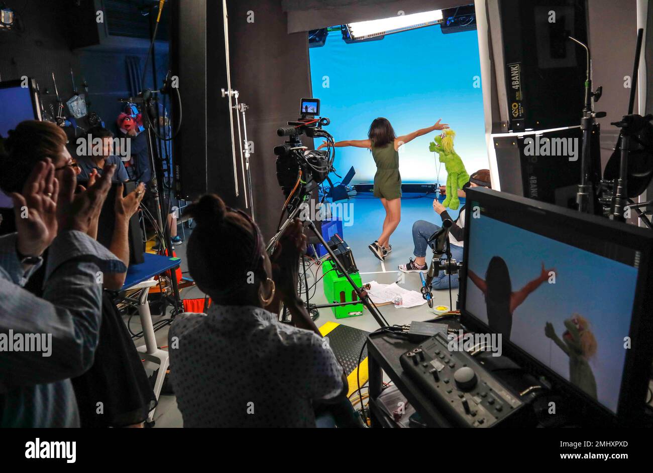 This Aug. 6, 2019 photo shows production members clapping for Salia ...