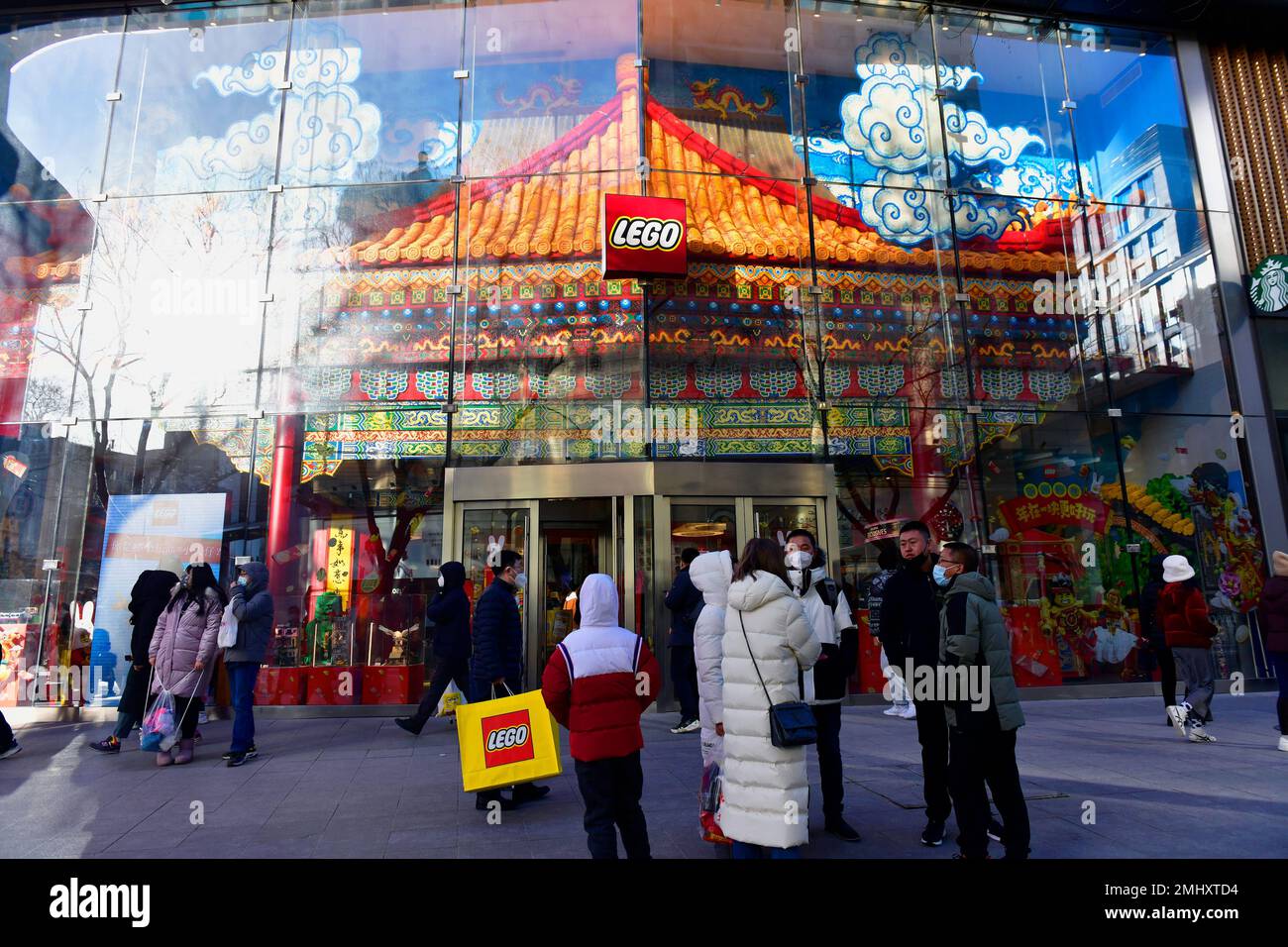 BEIJING, CHINA - JANUARY 26, 2023 - Citizens walk past the world's only ...