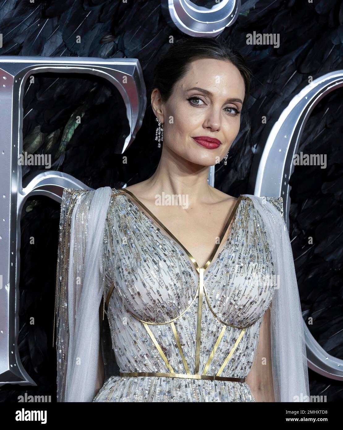 Actress Angelina Jolie poses for photographers on arrival at the ...