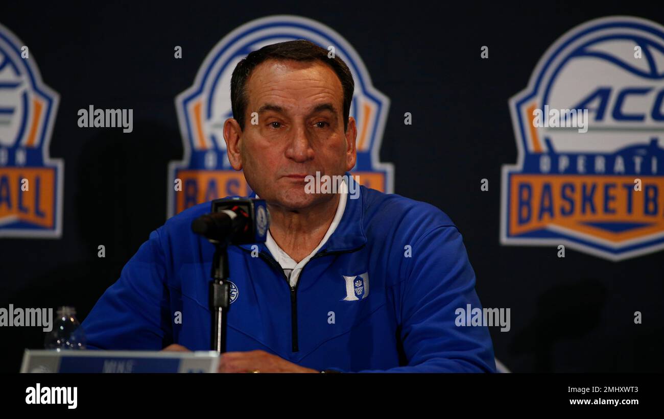 Duke basketball coach Mike Krzyzewski listens to a question during the ...