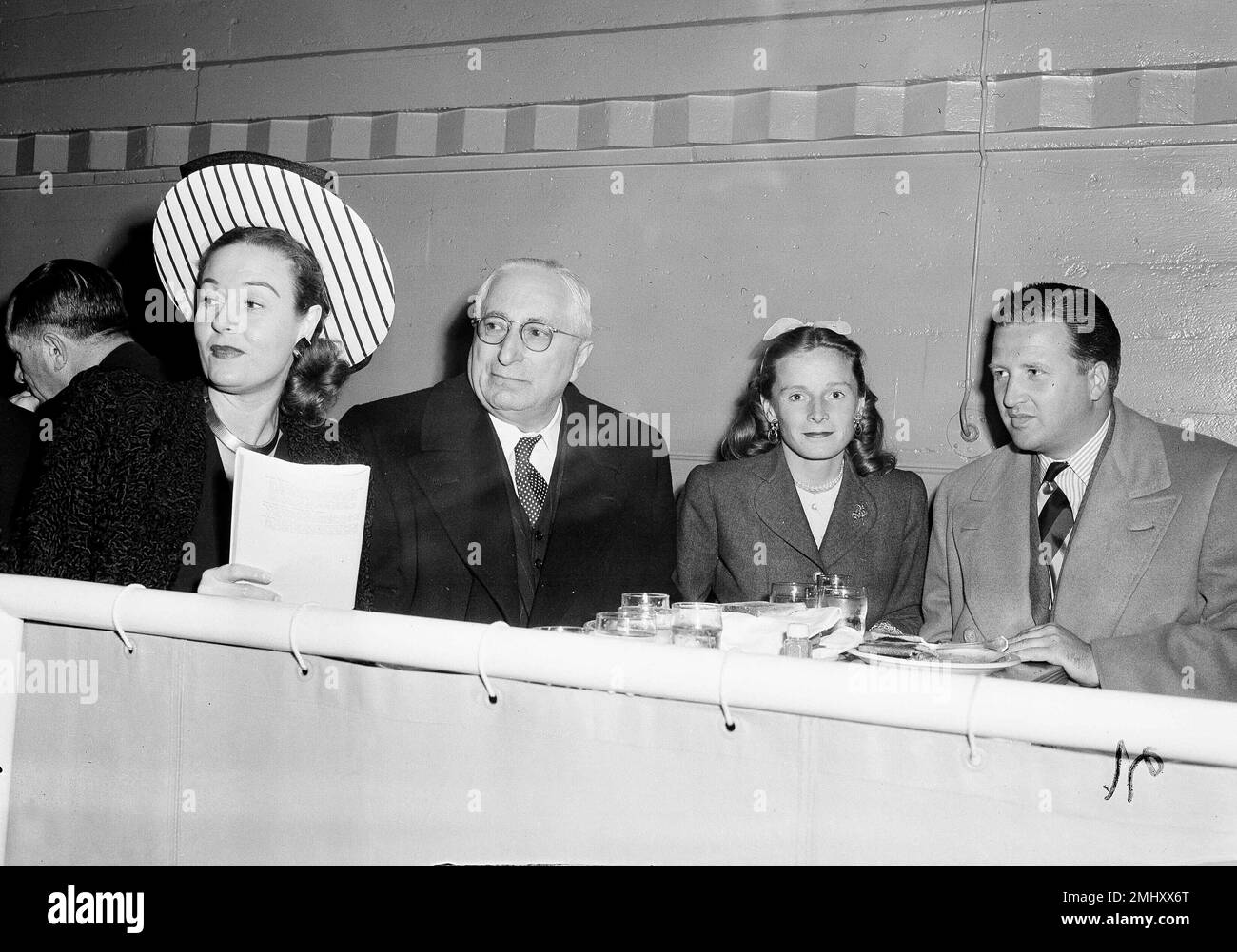 Seated in a box with friend Lorena Danker, left, and Henry Ford II and his wife Anne, Louis B ...