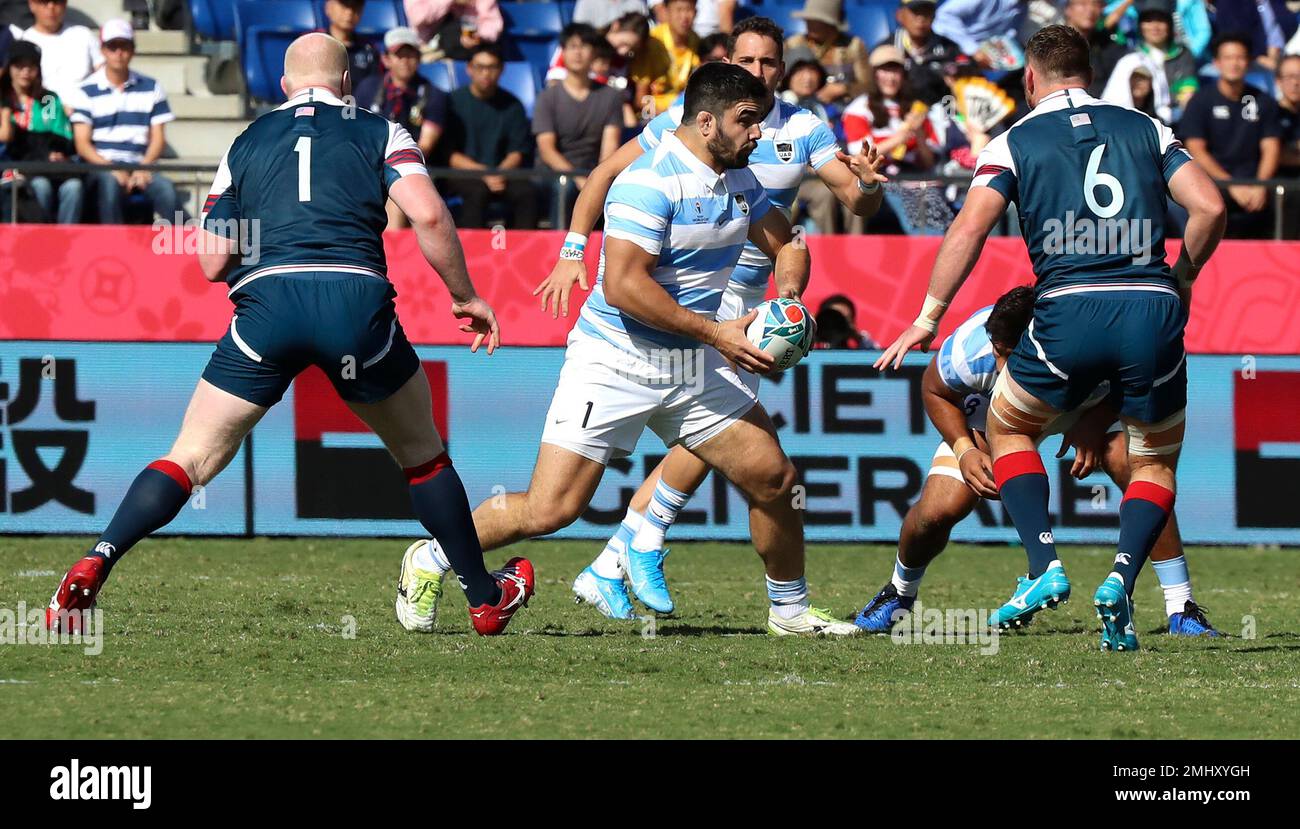 Argentina's Nahuel Tetaz Chaparro, centre, runs at United States' Eric ...