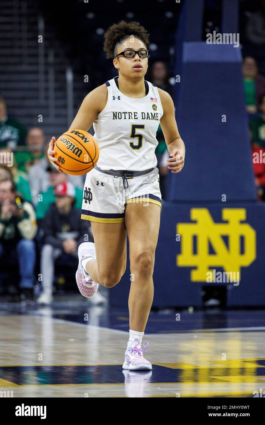 South Bend, Indiana, USA. 26th Jan, 2023. Notre Dame guard Olivia Miles (5) dribbles the ball up ...