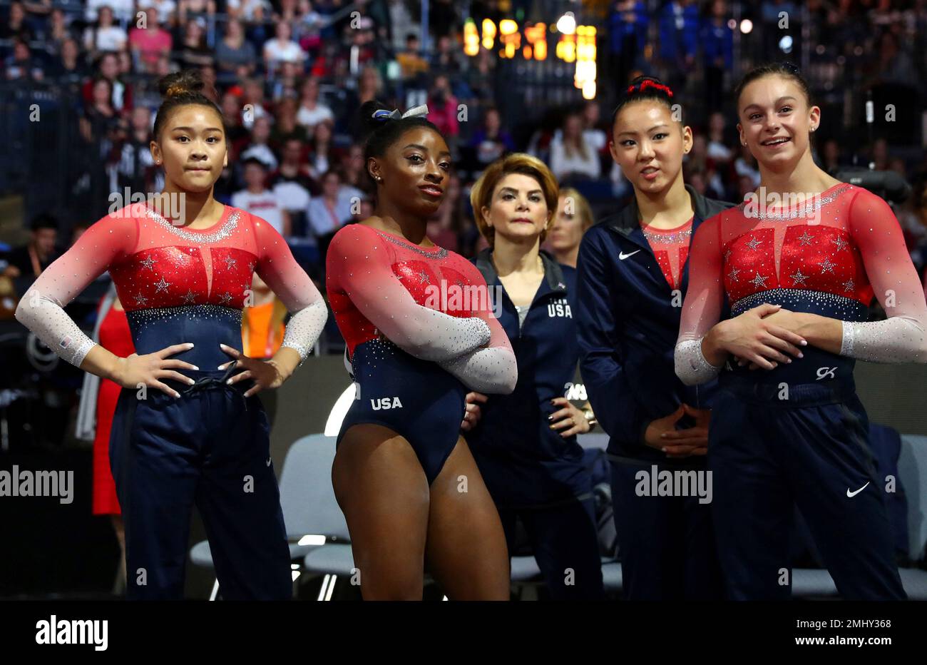 Simone Biles of the U.S., center, and her team mates attend the women's ...