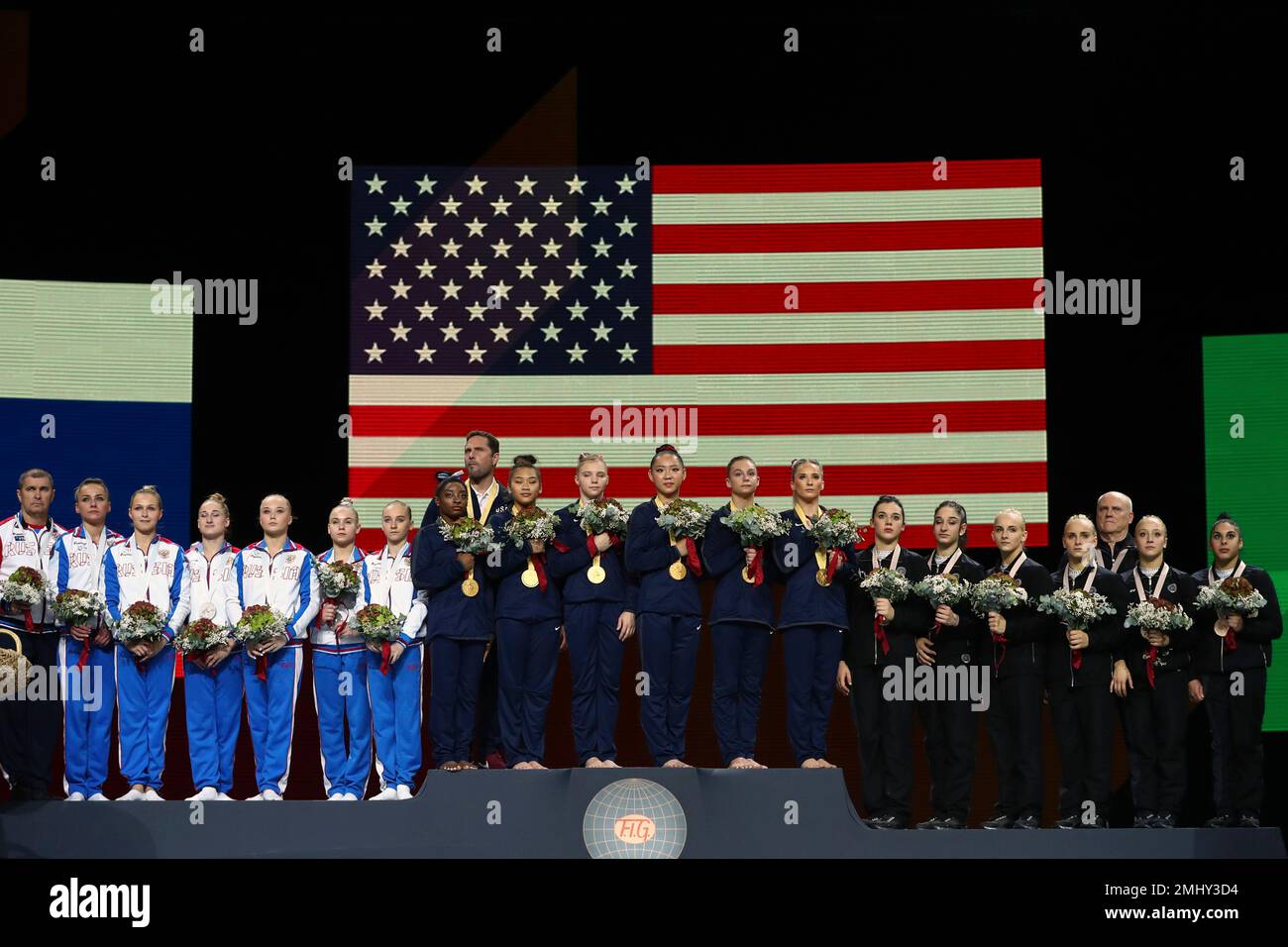Team U.S.A., center and gold medal, team Russia, left and silver medal ...