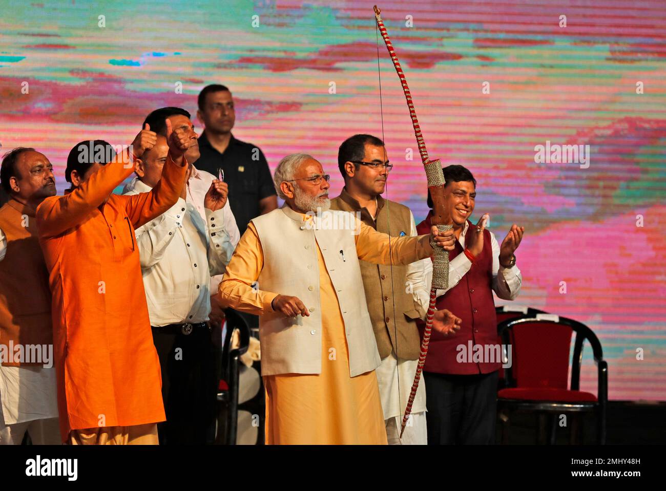 Indian Prime Minister Narendra Modi releases an arrow at an effigy of ...