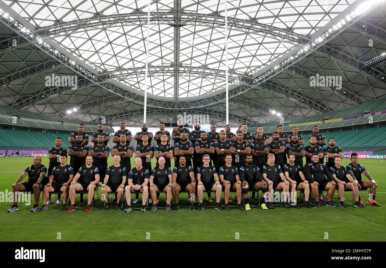 Fiji rugby team players and management pose for a group photo before ...