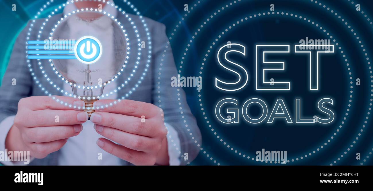 Hand writing sign Set Goals. Internet Concept Defining or achieving ...