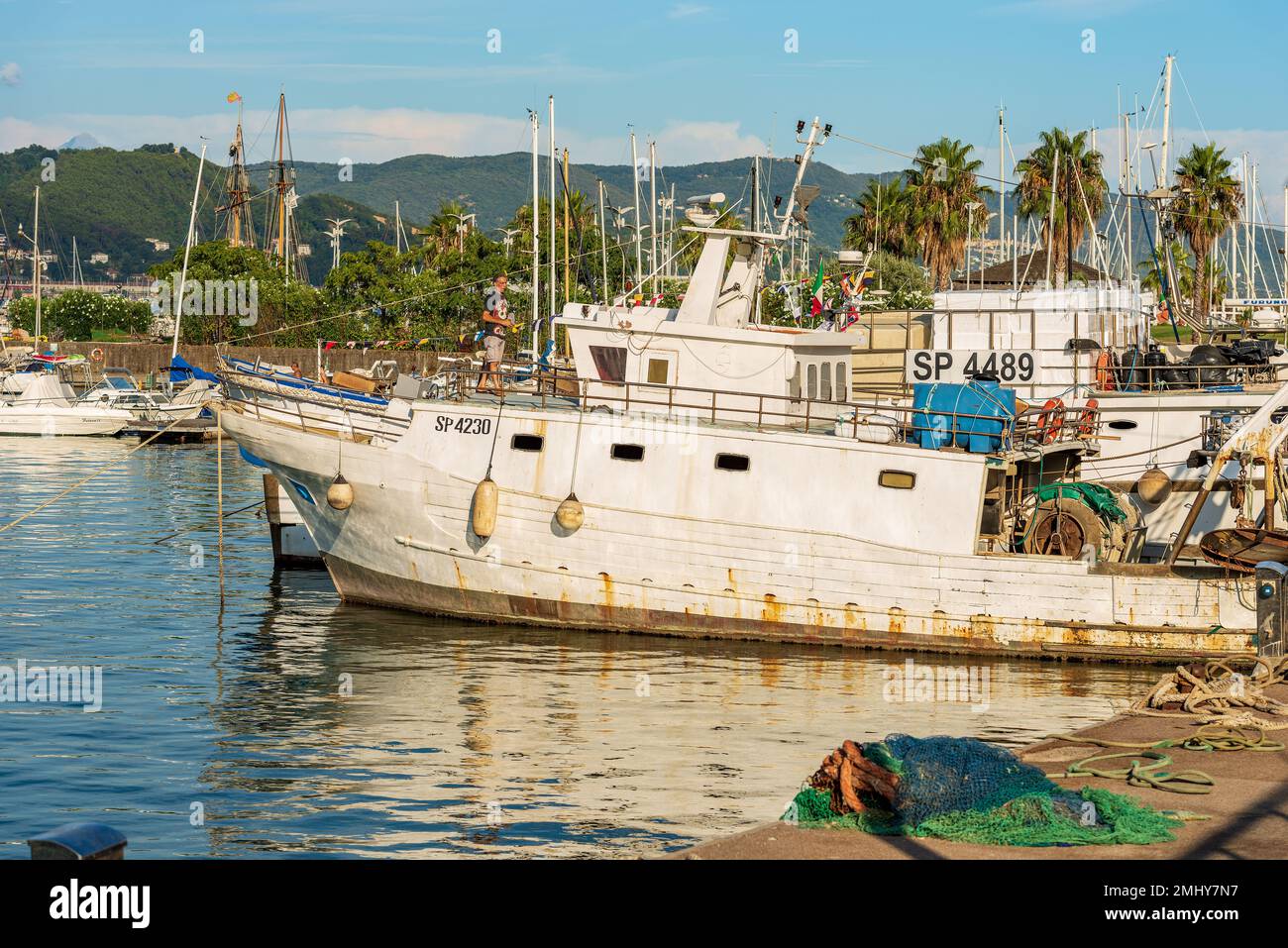 Old fishing boats used for trawling (trawler) in the port of La Spezia ...