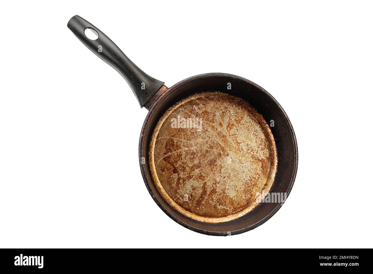 Dirty old frying pan. Isolated on white background. File contains ...
