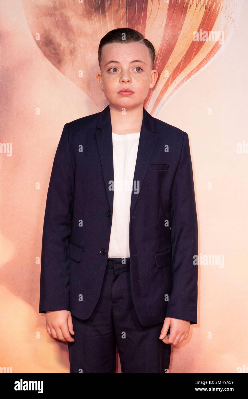 Actor Lewin Lloyd poses for photographers upon arrival at the premiere ...