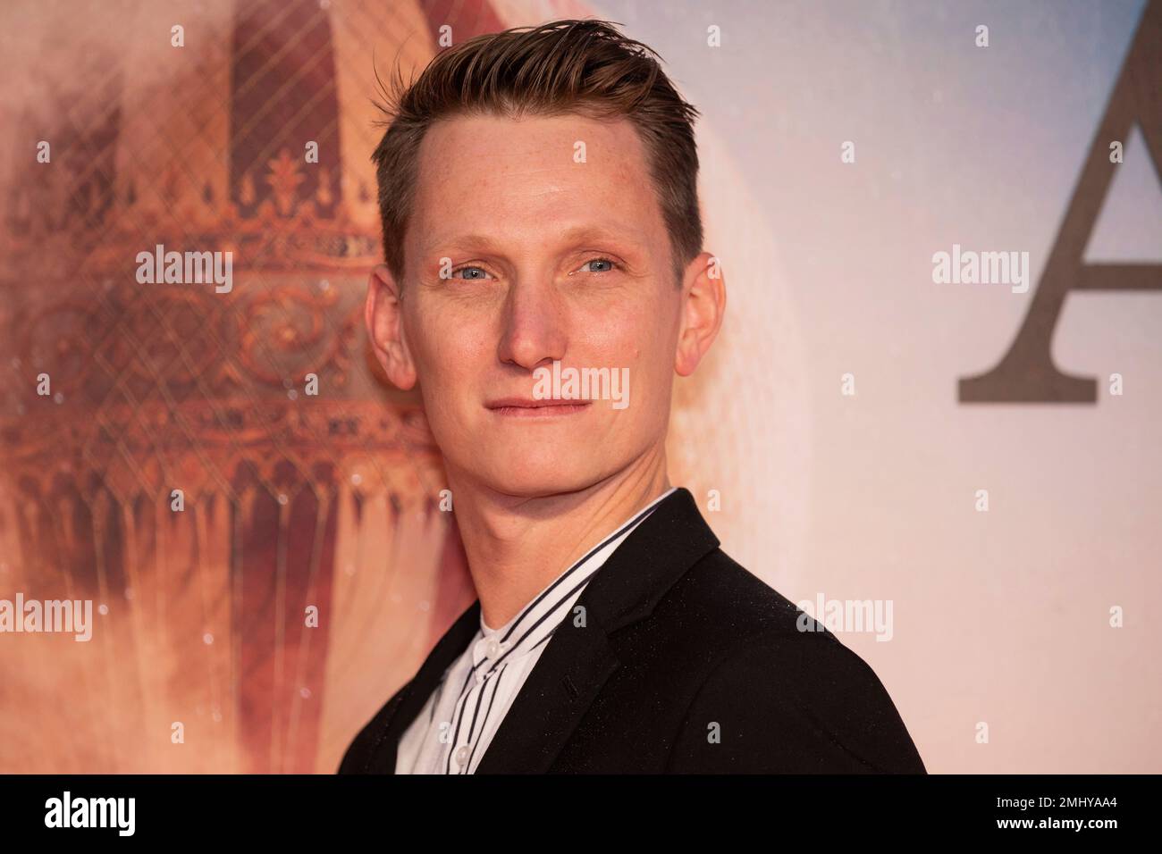 Director Tom Harper poses for photographers upon arrival at the ...