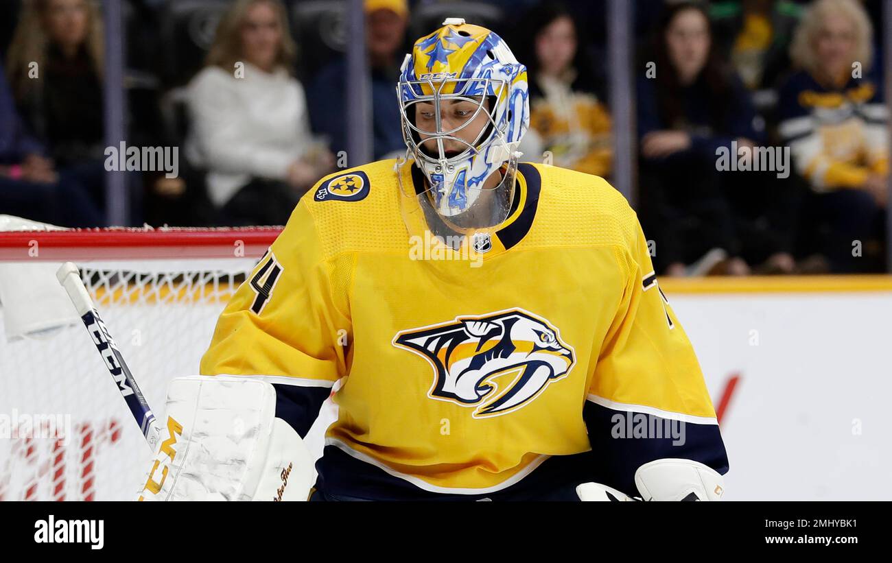 Nashville Predators goaltender Juuse Saros, of Finland, plays against ...