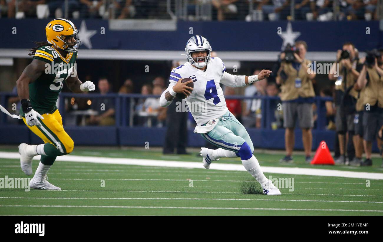 Dallas Cowboys quarterback Dak Prescott (4) carries the ball against ...