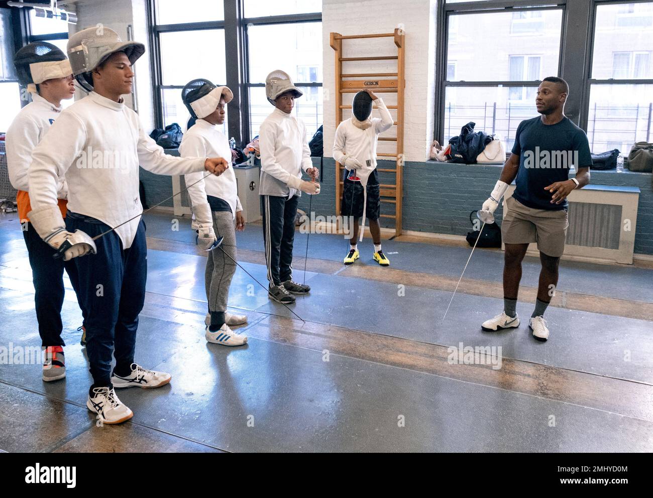 Olympic fencer medalist Daryl Homer works with students at the Peter ...