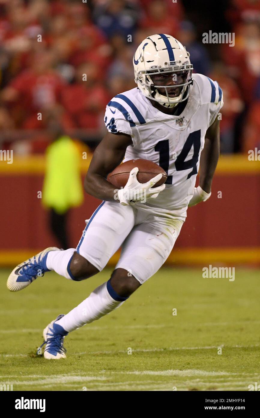 Indianapolis Colts wide receiver Zach Pascal (14) carries the ball ...
