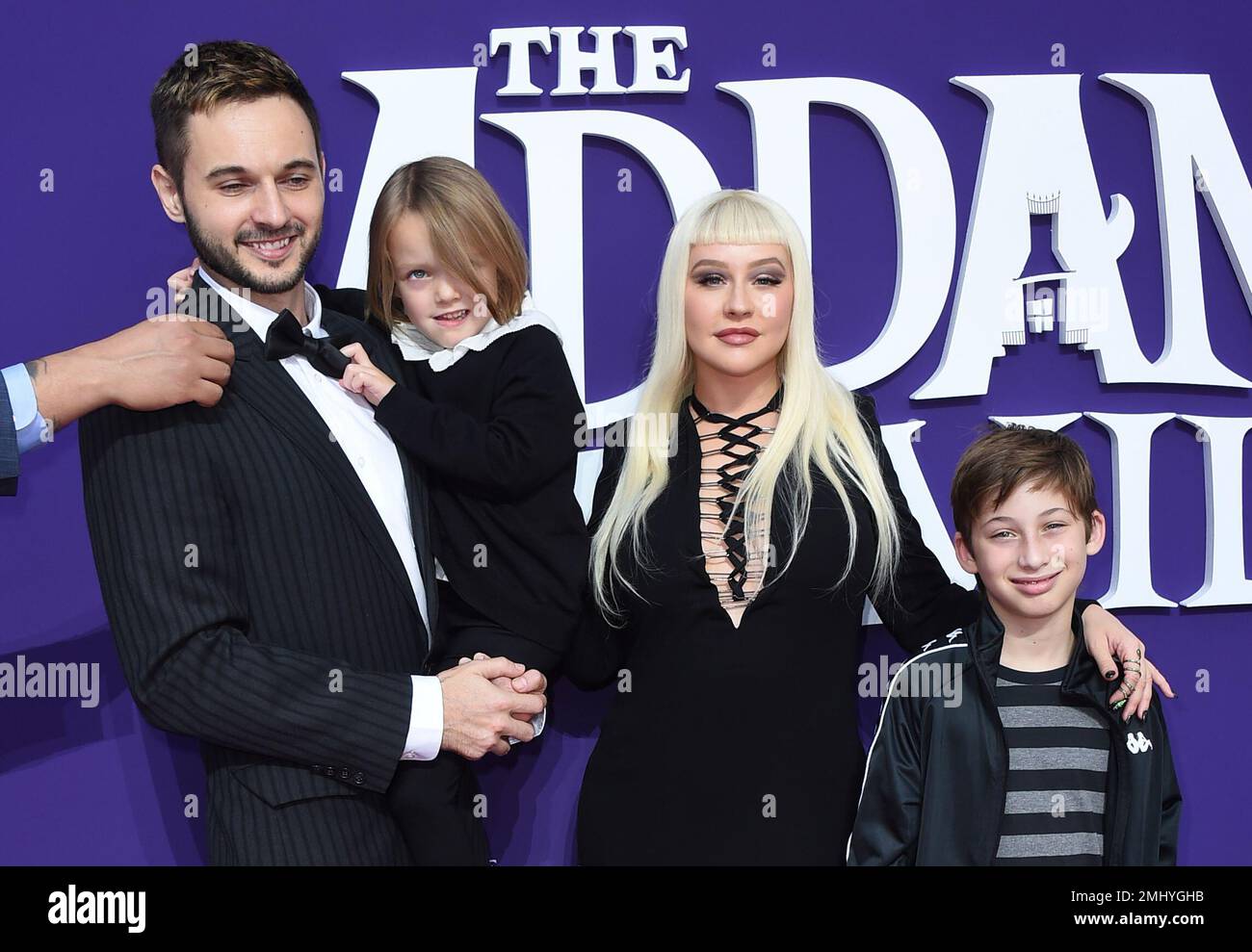 Christina Aguilera arrives with, from left, her husband Matthew Rutler ...