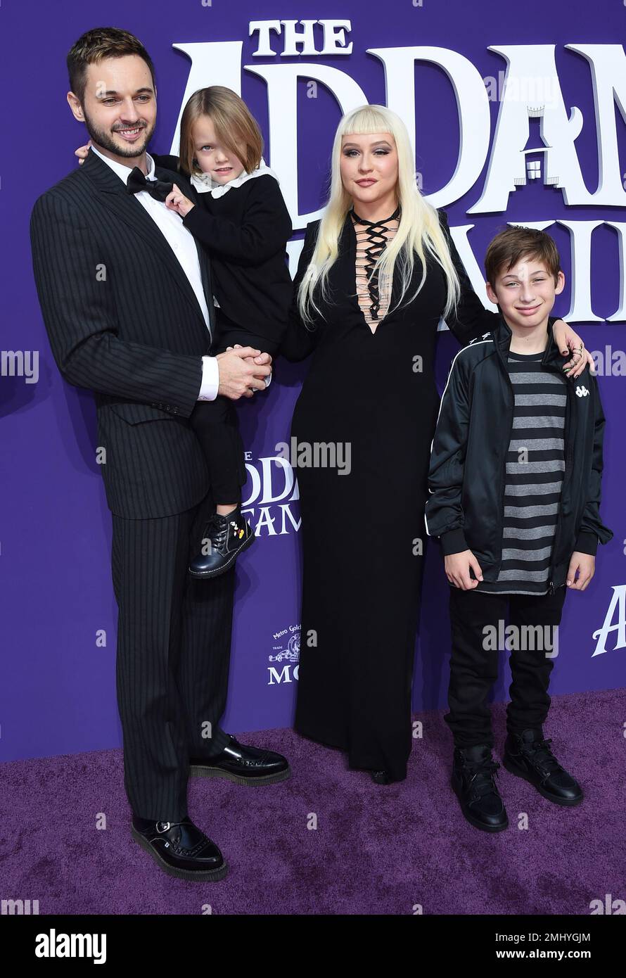 Christina Aguilera arrives with, from left, her husband Matthew Rutler ...