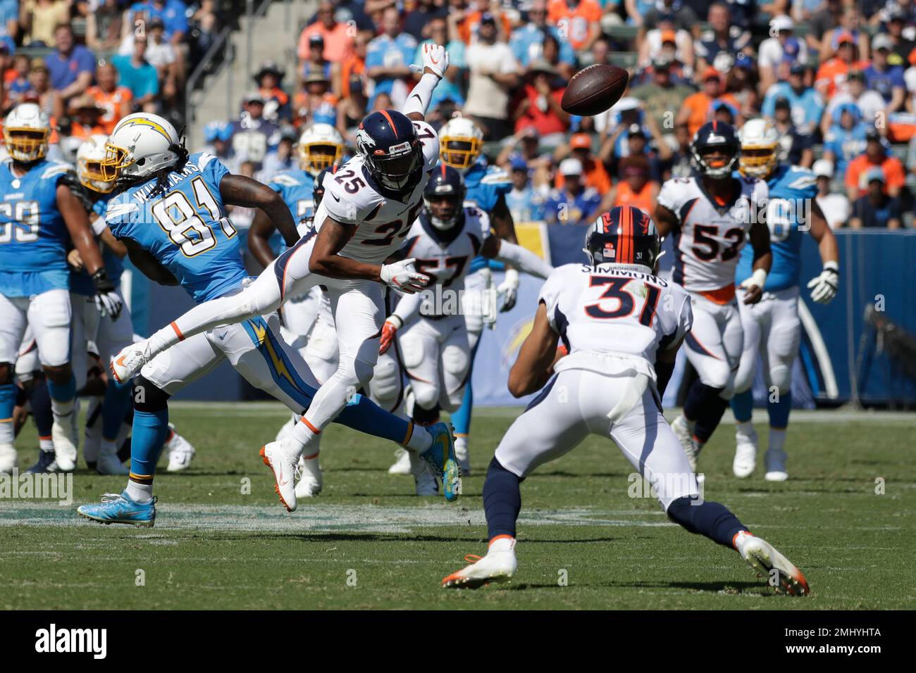 Denver Broncos free safety Justin Simmons (31) intercepts a pass ...