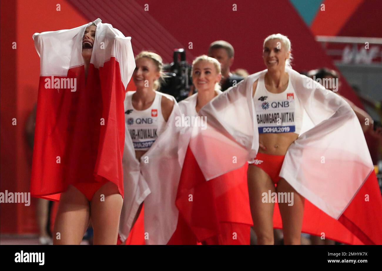Poland celebrates their silver medals in the women's 4x400 meter relay ...