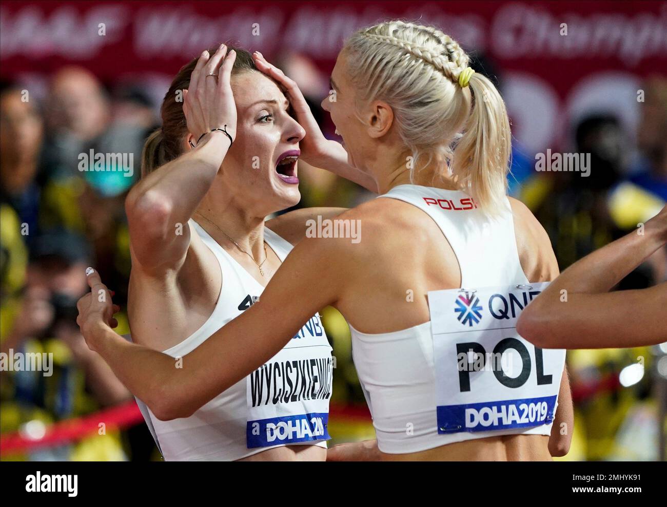 Poland celebrates their silver medals in the women's 4x400 meter relay ...