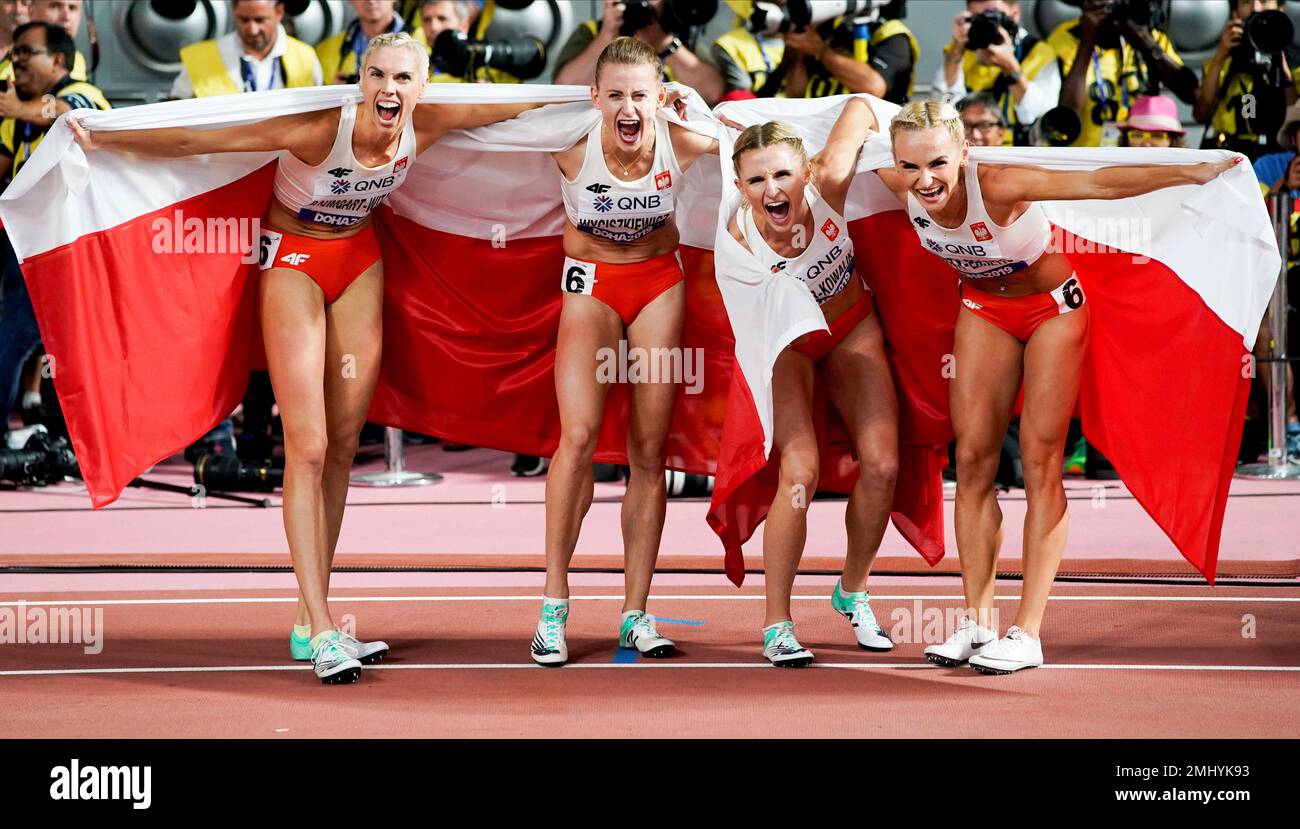 Poland celebrates their silver medals in the women's 4x400 meter relay ...