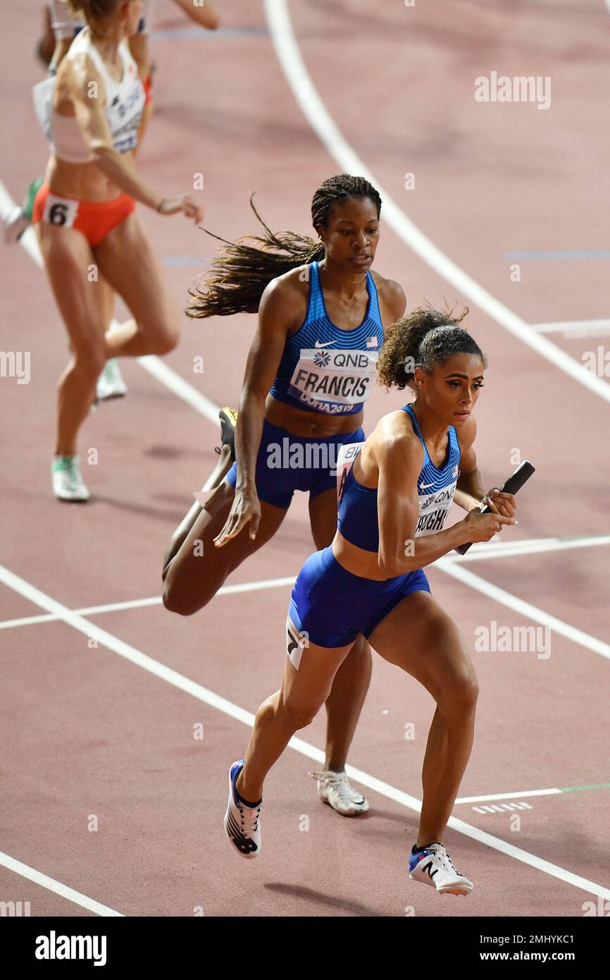 Gold medalists Phyllis Francis passes the baton to Sydney Mclaughlin of ...