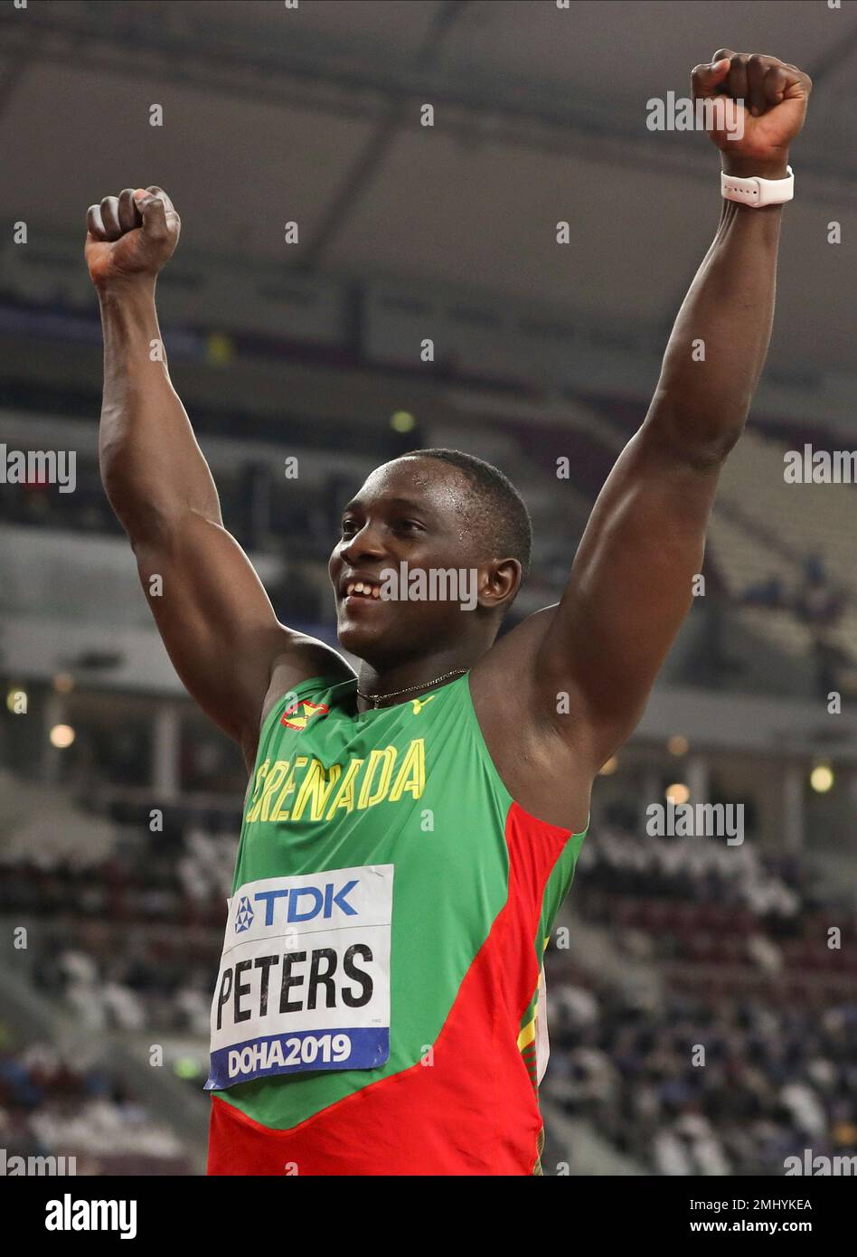 Gold medalist Anderson Peters, of Grenada, celebrates during the men's ...
