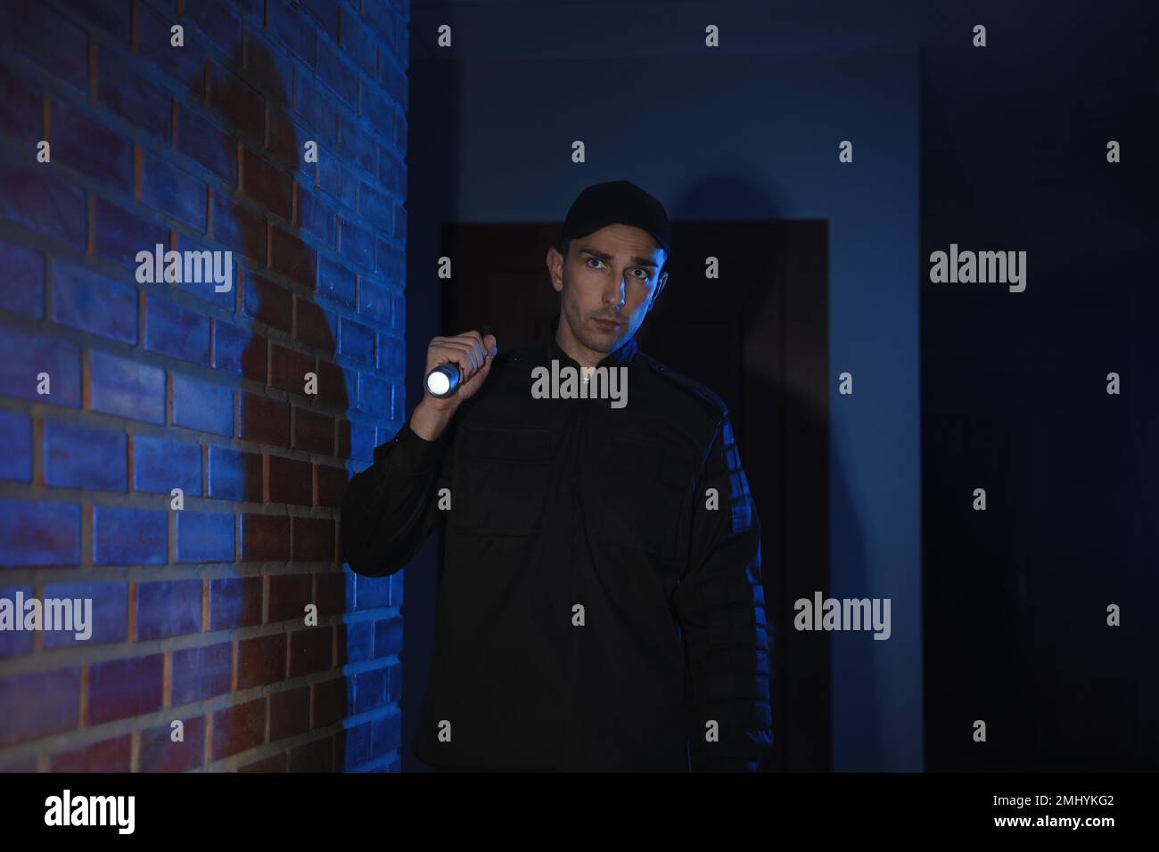 Man security guard flashlight hi-res stock photography and images - Alamy
