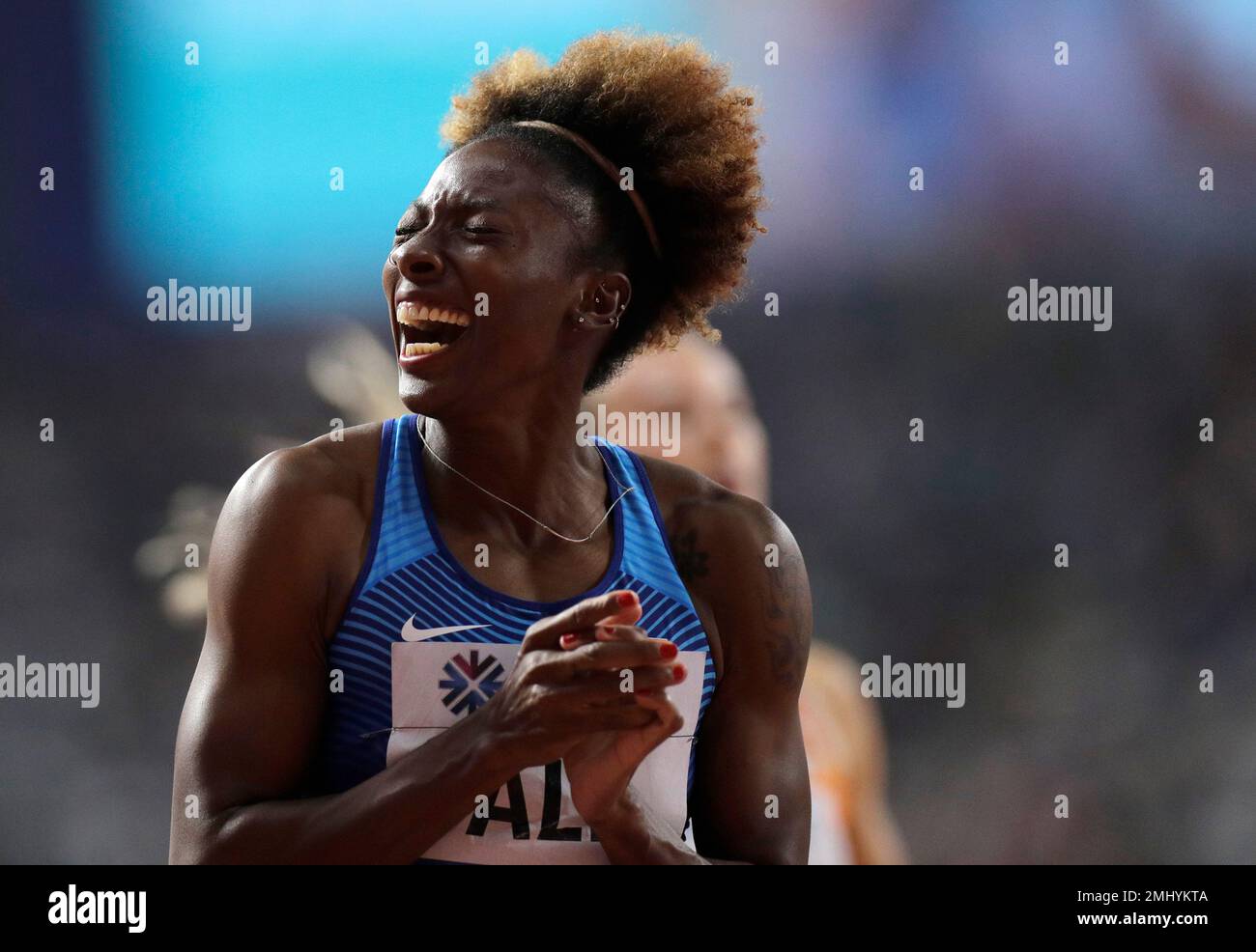 Nia Ali, of the United States celebrates winning the gold medal in the ...