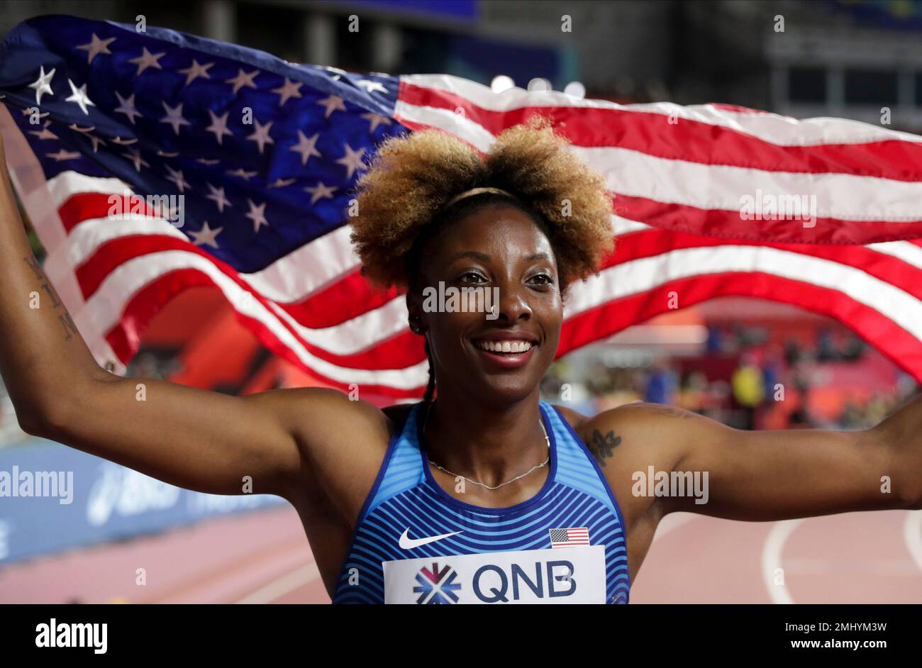 Gold medalist Nia Ali, of the United States, celebrates after the the ...