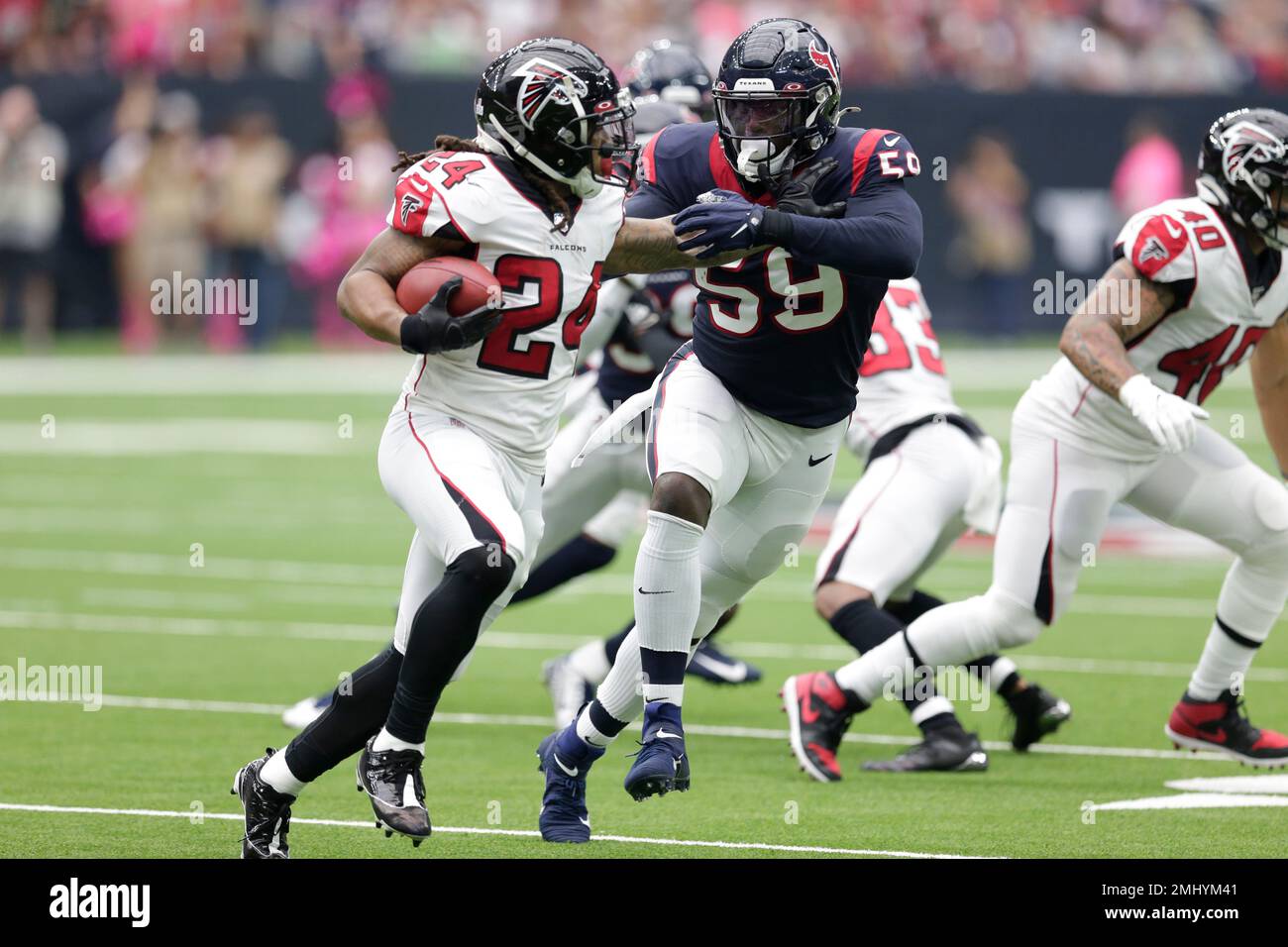 Atlanta Falcons running back Devonta Freeman (24) runs past Houston ...